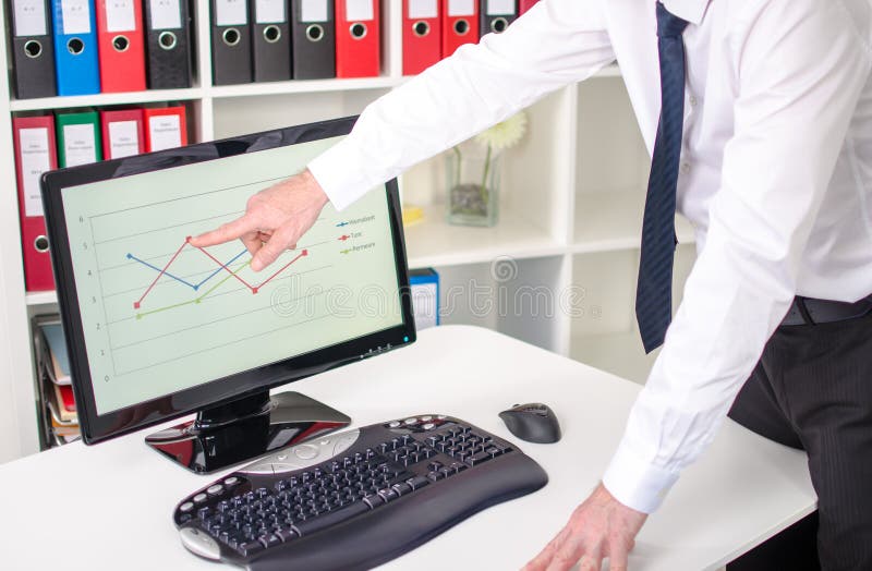Businessman Showing a Graph on the Screen Stock Image - Image of ...