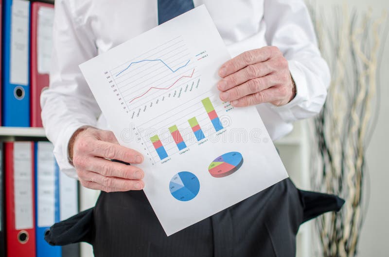 Businessman Showing Graphs with Poor Results Stock Photo - Image of ...