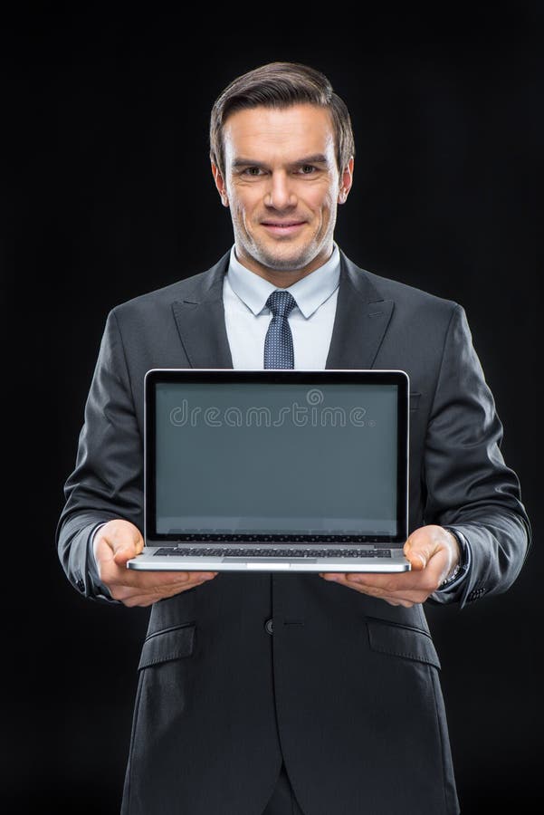 Businessman showing laptop stock image. Image of adult - 84045189