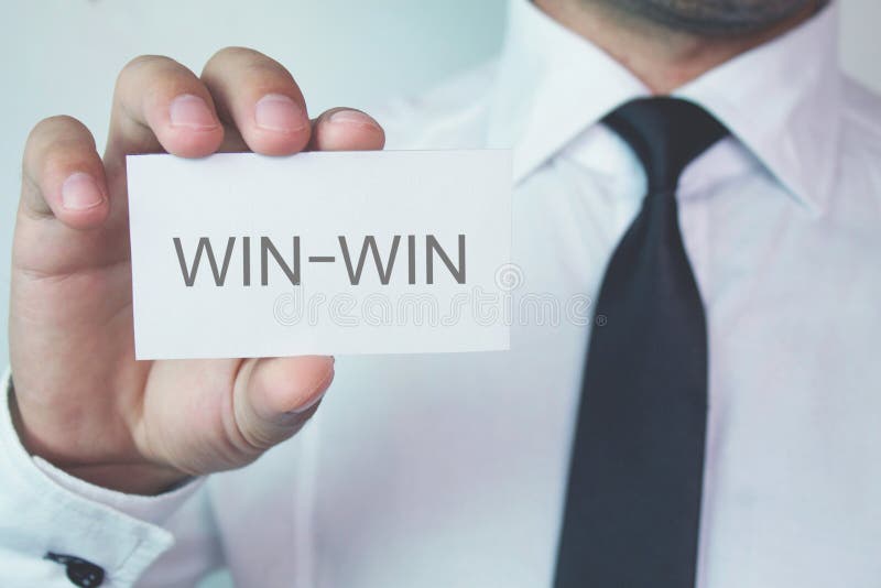 Businessman Showing Text Win-Win on Business Card. Stock Image - Image ...