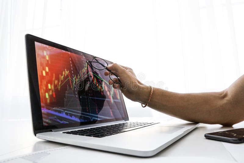 Businessman Shows the Screen on Laptop the Graph of Growth Stock Photo ...