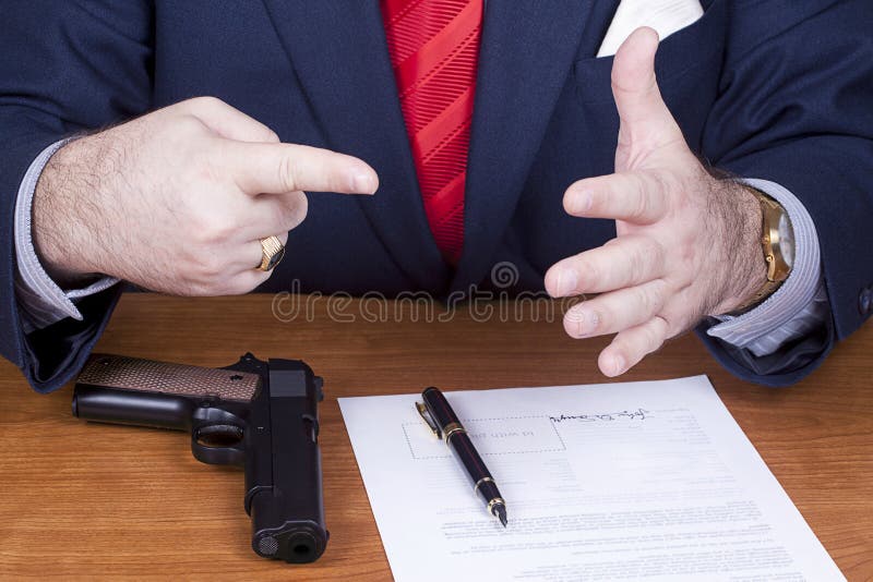 Businessman Signing a Contract with Gun Stock Photo - Image of finger ...