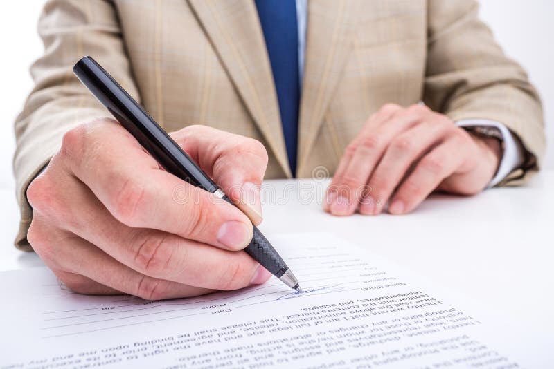Businessman Signing a Document. Stock Image - Image of manager ...