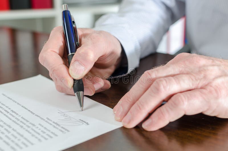 Businessman Signing a Document Stock Photo - Image of agreement ...