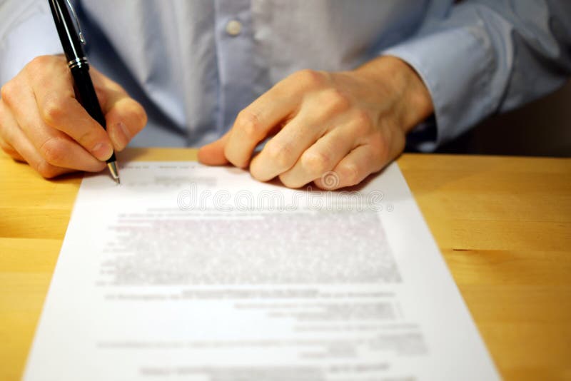 Businessman Signing Document at Desk Stock Photo - Image of people ...