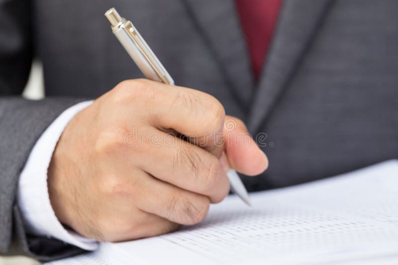 Businessman Signing a Document Stock Image - Image of document, form ...