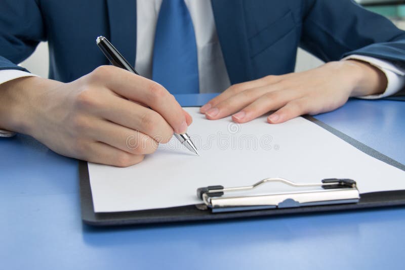 Businessman Signing Documents Stock Photo - Image of male, management ...