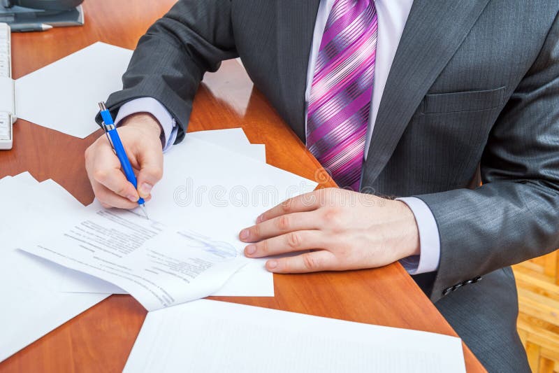 Businessman Signs Documents Stock Image - Image of person, finance ...