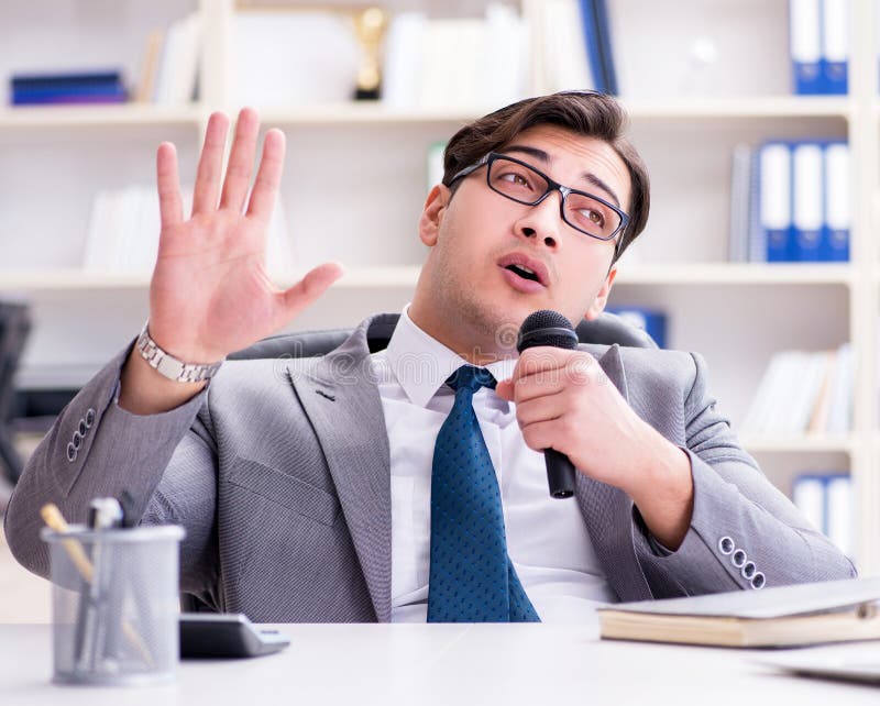 Businessman Singing in the Office Stock Photo - Image of promotion ...
