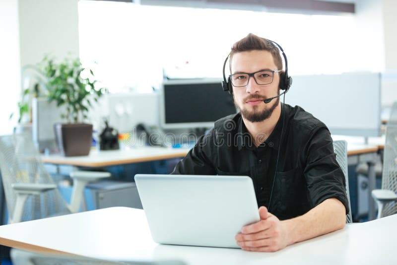 Businessman Sitting at the Desk with Laptop Computer Stock Image ...