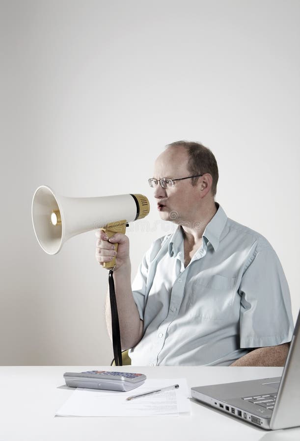 Man Talking Into Megaphone stock image. Image of concept - 10746255