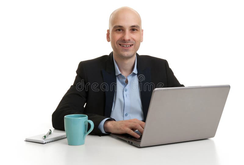 Businessman Sitting at Desk, Working on Laptop Computer Stock Photo ...
