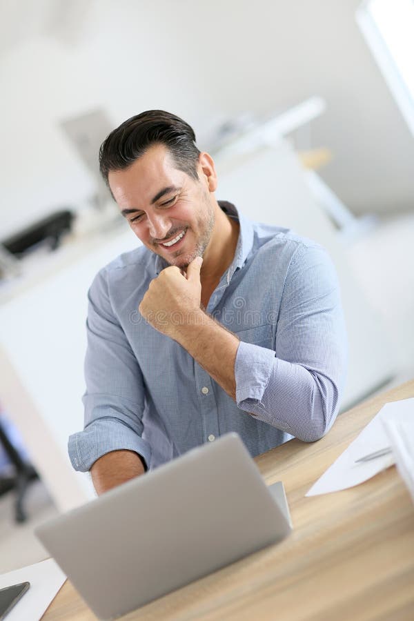 Businessman Sitting at Office Working Stock Photo - Image of portrait ...