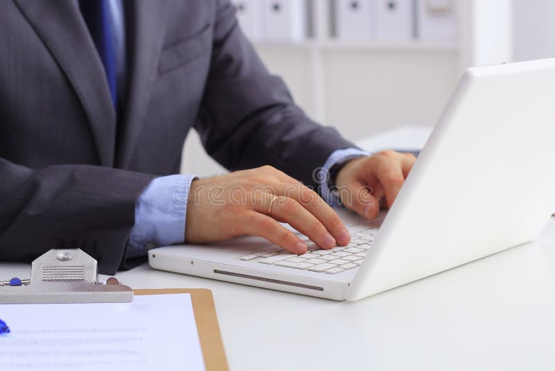 Businessman Sitting in Office, Working with Laptop Computer Stock Image ...