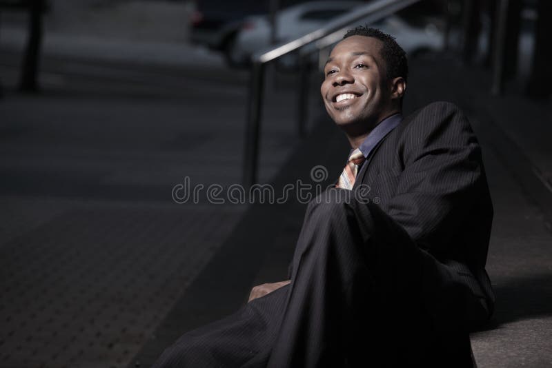 Businessman Sitting and Smiling Stock Image - Image of attractive ...