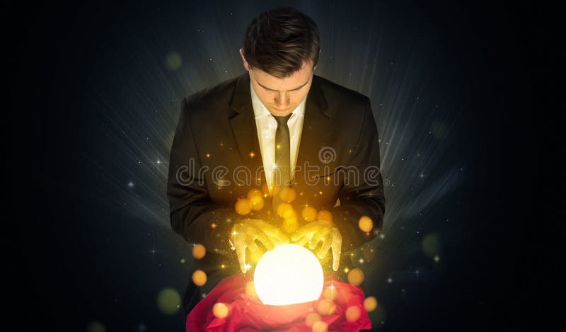 Businessman Sitting with Sparkling Magic Ball Stock Photo - Image of ...