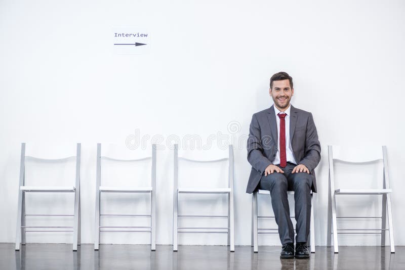 Businessman Sitting and Waiting for Interview in Office Stock Photo ...