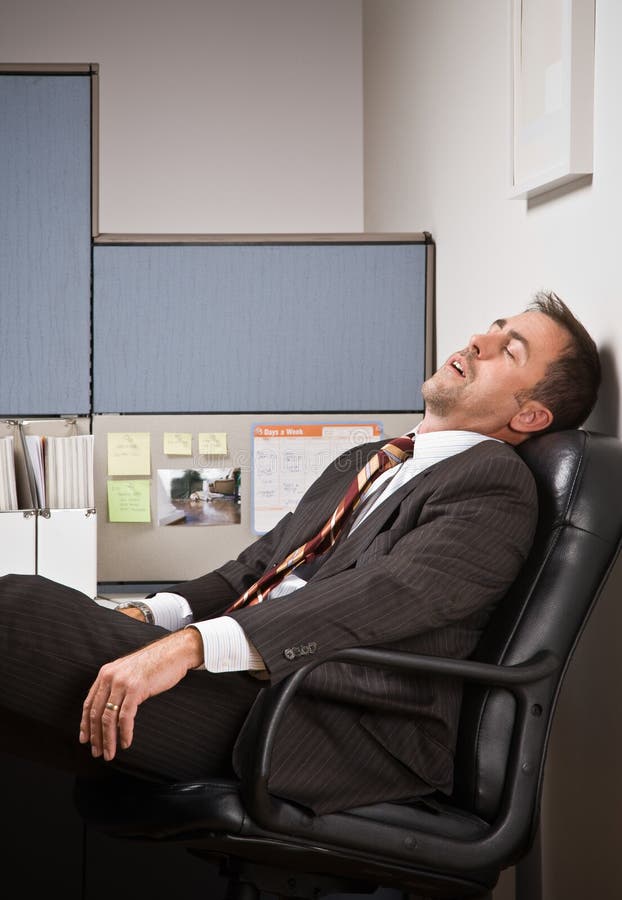 Businessman Sleeping at Desk with Feet Up Stock Photo - Image of ...
