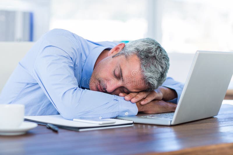 Businessman Sleeping on Laptop Computer Stock Photo - Image of person ...