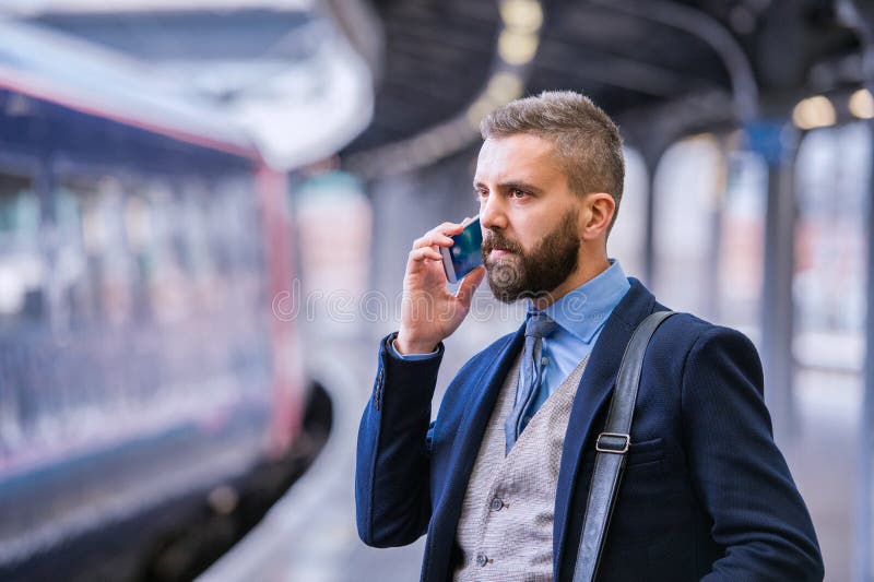Businessman with Smartphone, Making a Phone Call, Train Platform Stock ...