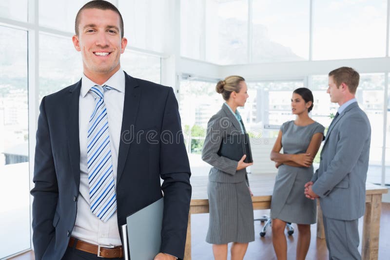 Business Man Holding Files Behind Stock Photos - Free & Royalty-Free ...