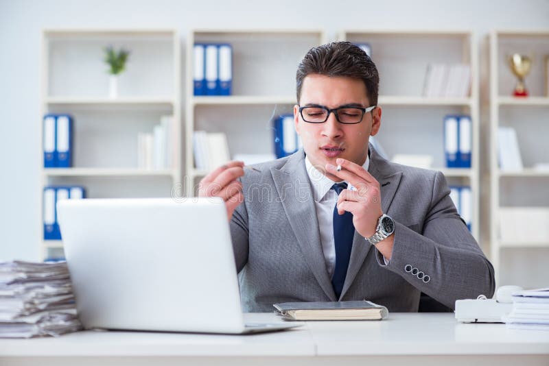 The Businessman Smoking in Office at Work Stock Photo - Image of smoke ...