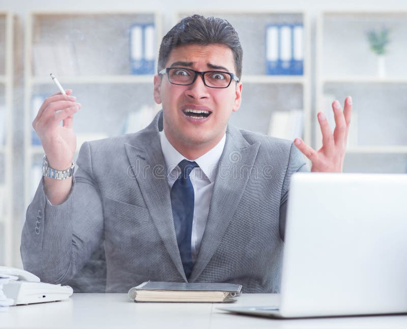 Businessman Smoking in Office at Work Stock Photo - Image of habit ...