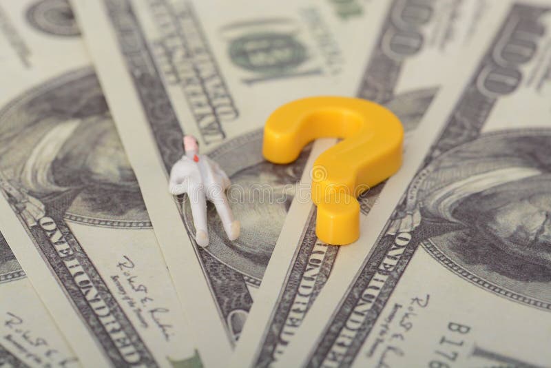 The Businessman and the Stack of Money Banknotes, a Question Mark ...