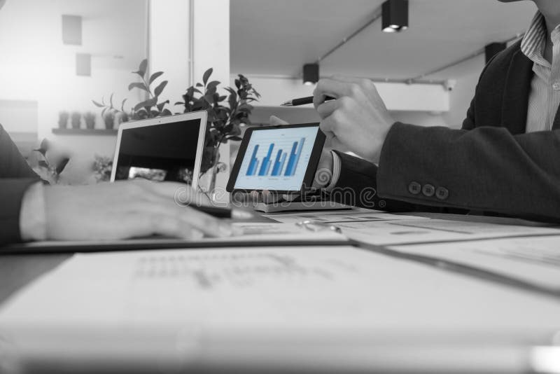 Businessman and Staff Working with Computer on Table Stock Photo ...
