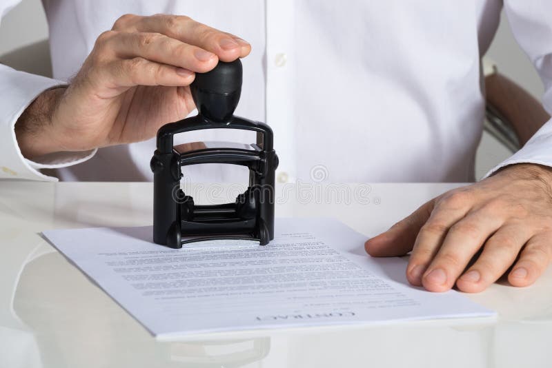 Businessman Stamping with Approved Stamp on Document Contract. Business ...