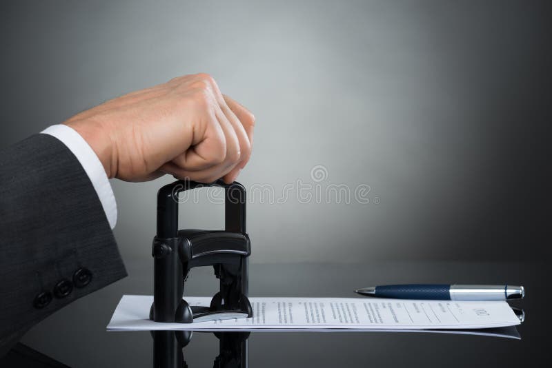 Businessman Stamping with Approved Stamp on Document Contract. Business ...