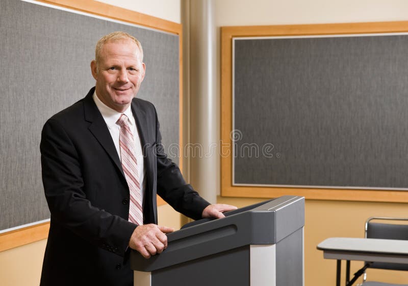 Businessman Standing Behind Podium Stock Photo - Image of presentation ...