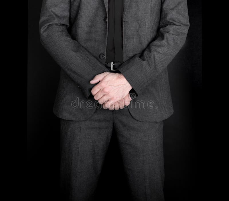 Businessman Standing with Hands Folded Stock Image - Image of standing ...