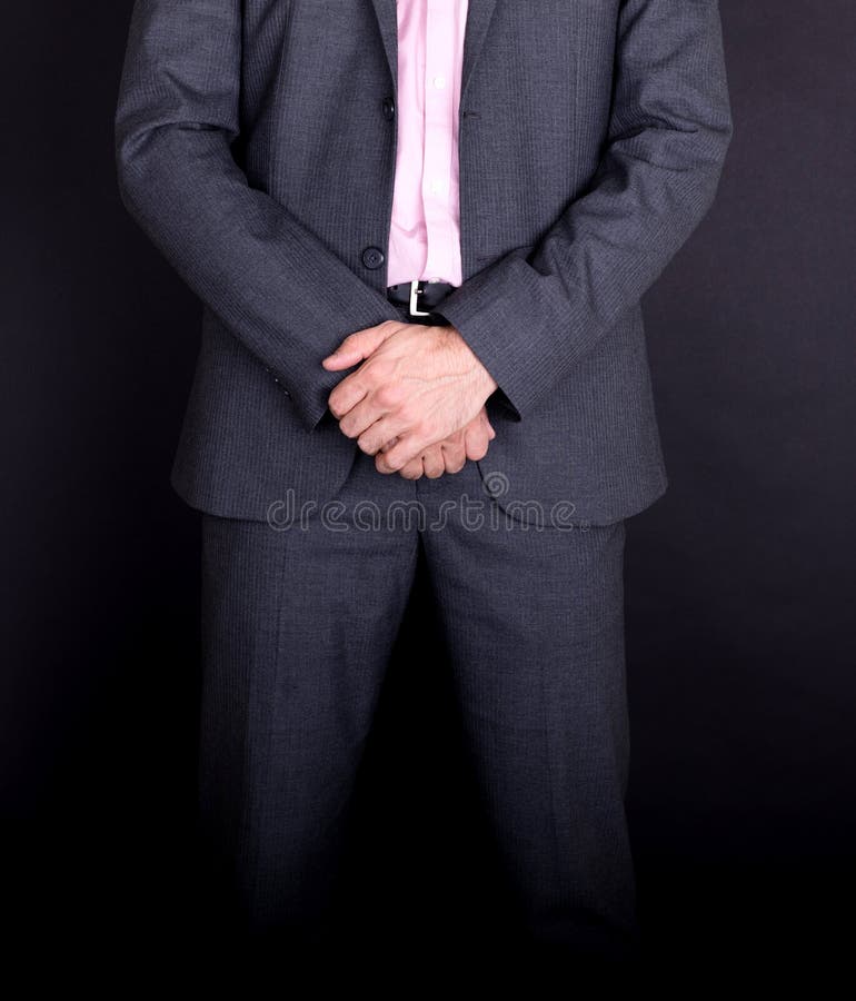 Businessman Standing with Hands Folded Stock Image - Image of standing ...
