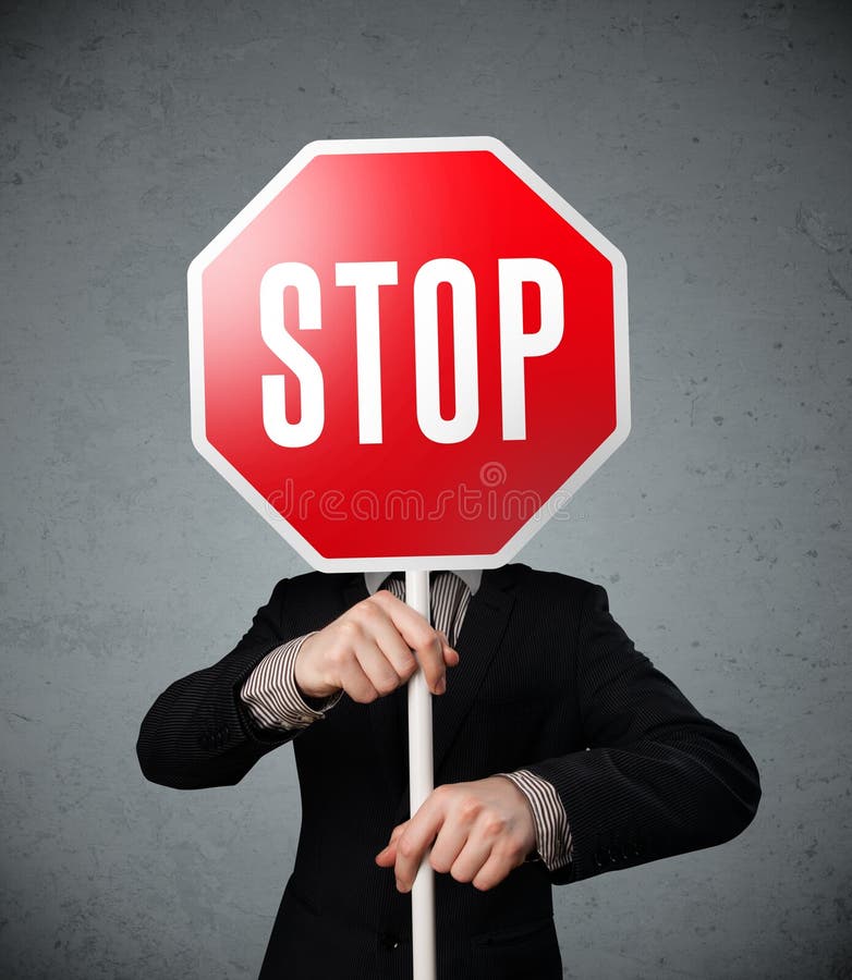 391 Businessman Standing Holding Stop Sign Stock Photos - Free ...