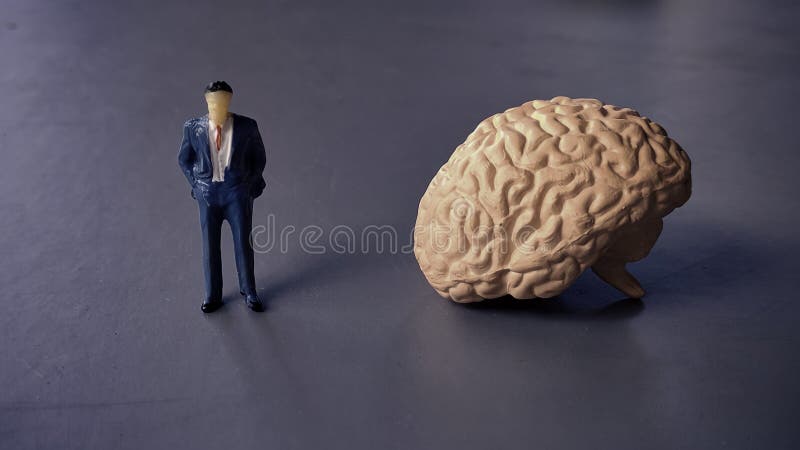 Businessman Standing beside Human Brain Representing Intelligence ...