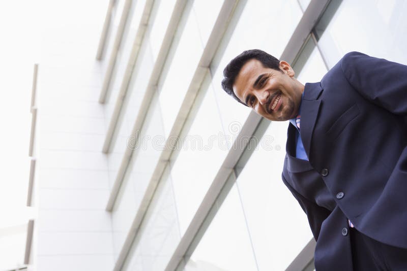 Businessman Standing Outside Office Building Stock Photo - Image of ...