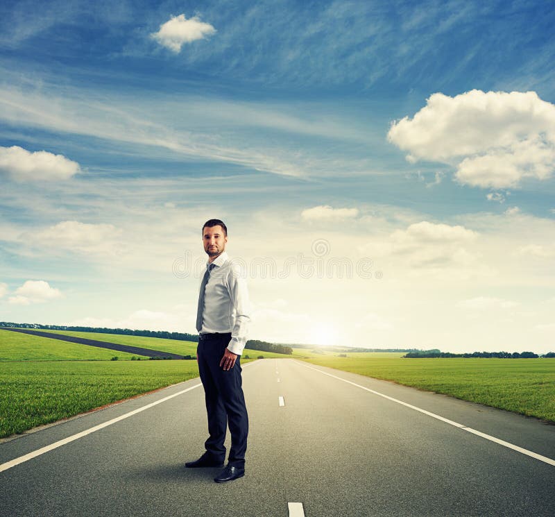 Businessman Standing on the Road Stock Image - Image of adventure, road ...