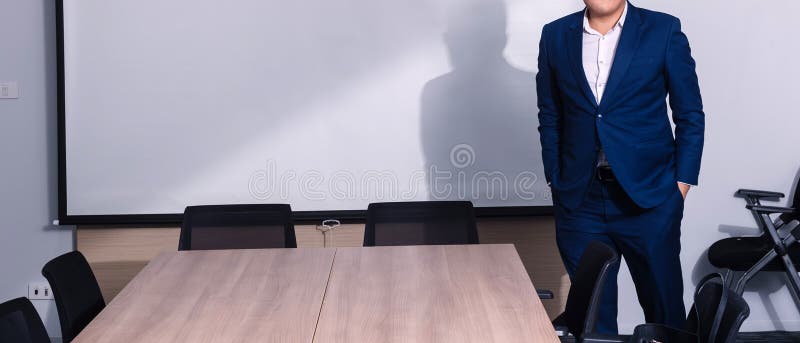 Businessman Standing in Seminar Room Stock Image - Image of ...