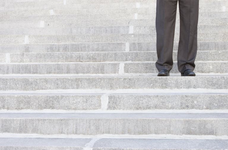 Businessman Standing on Steps Stock Image - Image of front, certainty ...