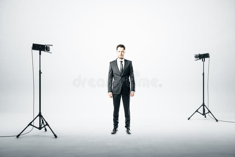 Businessman Standing in Studio with Spotlight Stock Image - Image of ...
