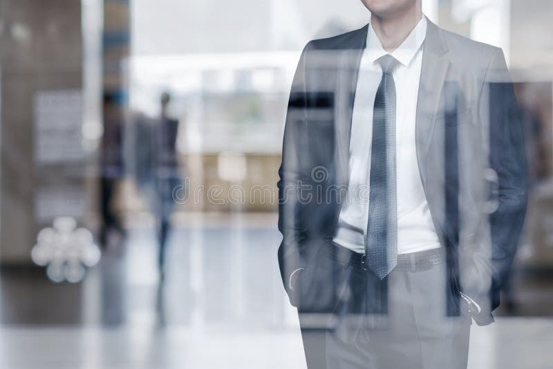 A Businessman is Standing in a Suit Near the Window Stock Image - Image ...