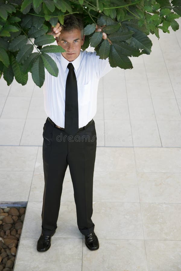 Businessman Under Exit Sign Stock Image - Image of escape, security ...