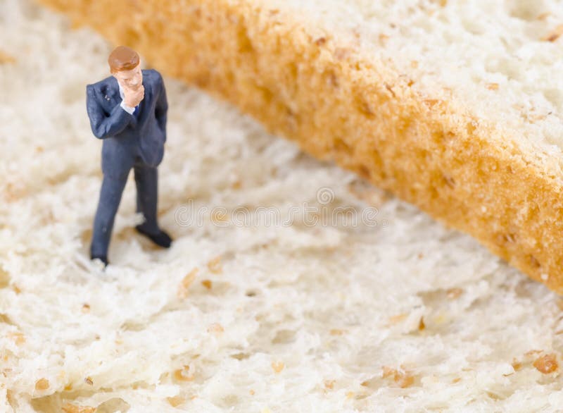 Businessman Standing on the Whole Wheat Bread Stock Image - Image of ...
