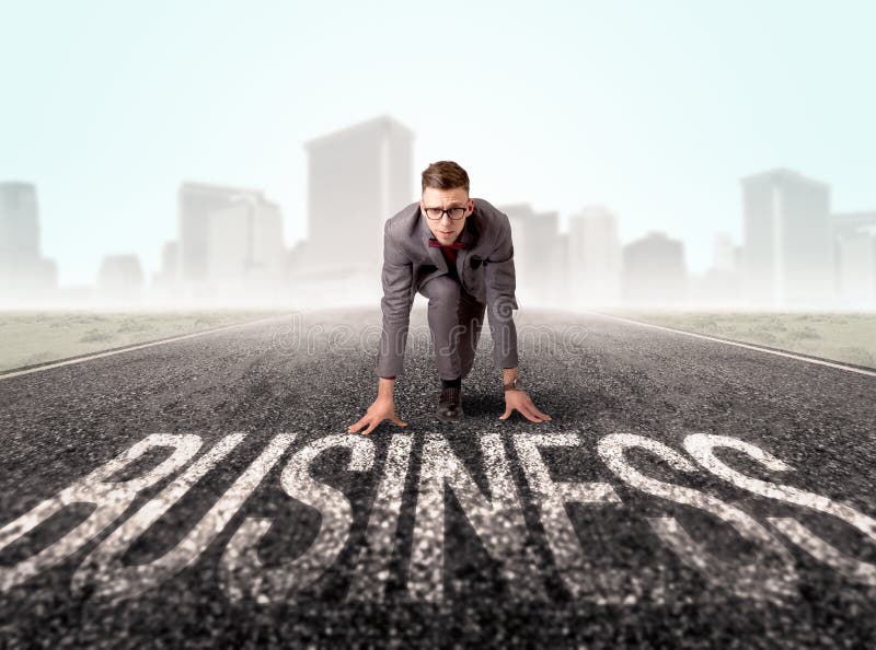 Businessman at start line stock photo. Image of male - 95847946