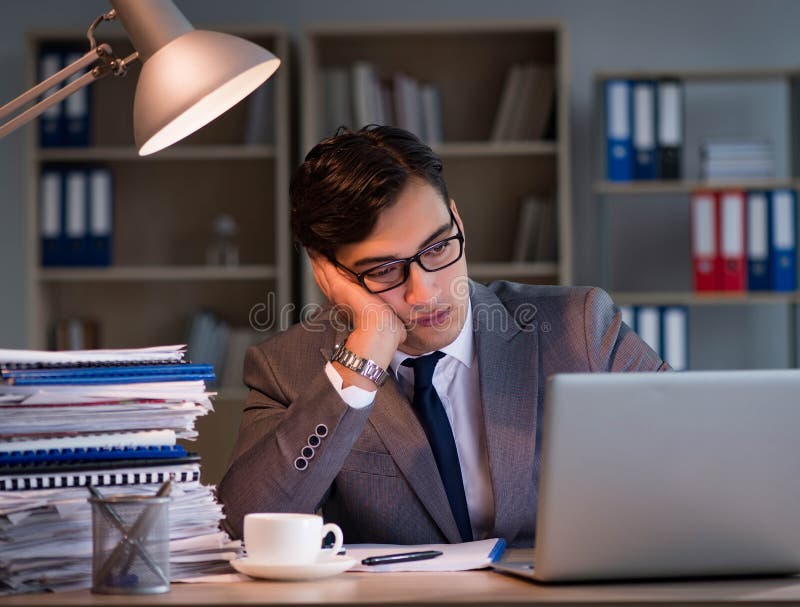 Businessman Staying in the Office for Long Hours Stock Photo - Image of ...