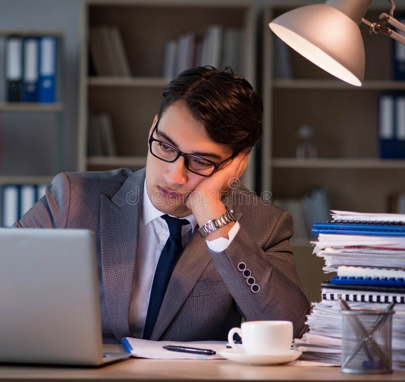 Businessman Staying in the Office for Long Hours Stock Image - Image of ...