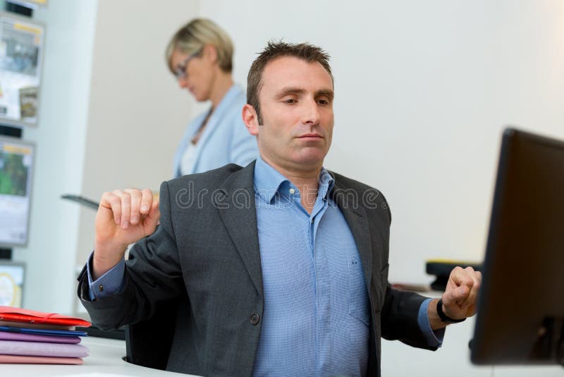 Businessman Stretching Back after Hard Work Stock Image - Image of ...