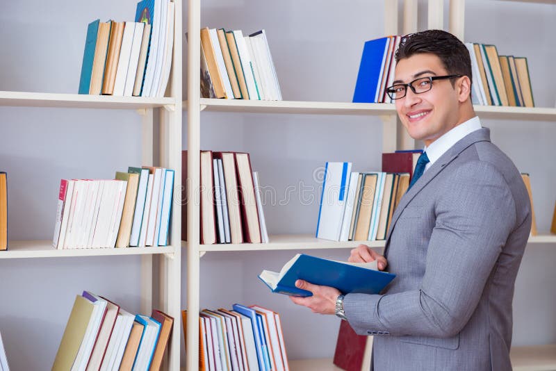 The Businessman Student Reading a Book Studying in Library Stock Image ...