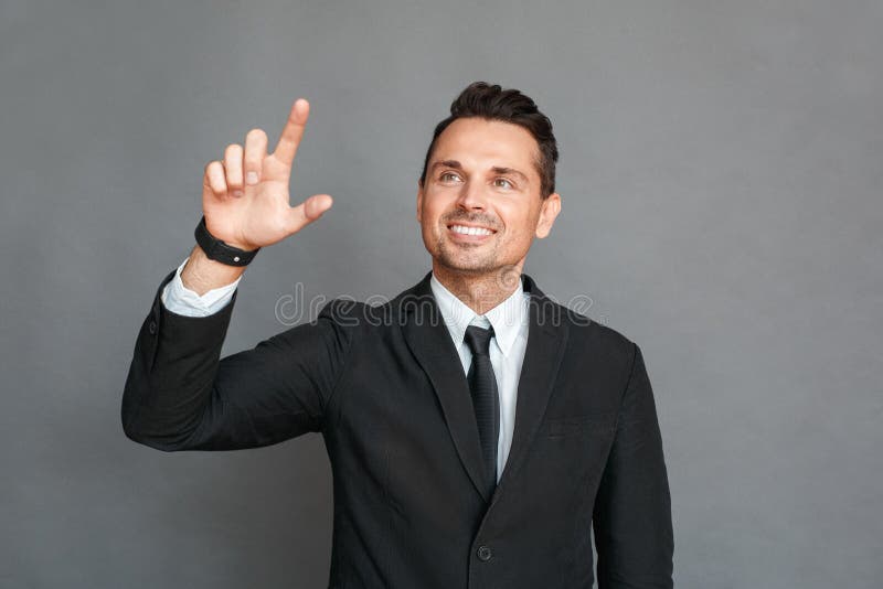 Businessman Studio Standing Isolated on Grey Looking at News at ...